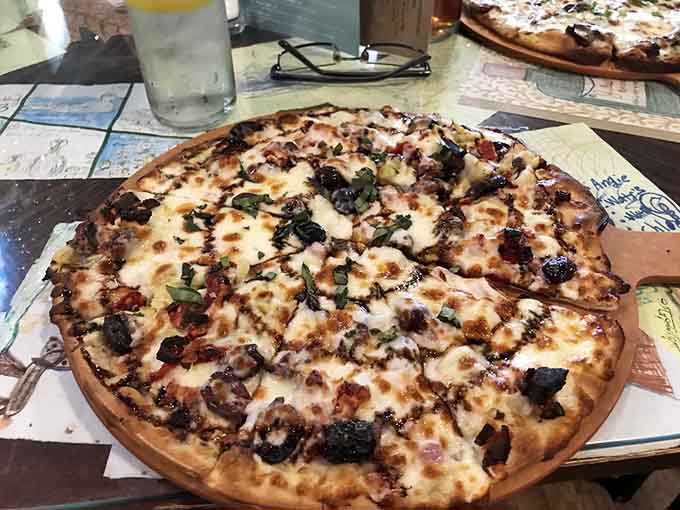 The Veggie Feast Pizza shows that meatless options can be just as craveable as their carnivorous counterparts here.