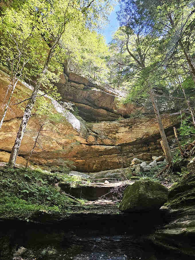 This natural rock shelter has witnessed centuries of visitors, from indigenous peoples to modern hikers seeking connection with something timeless.