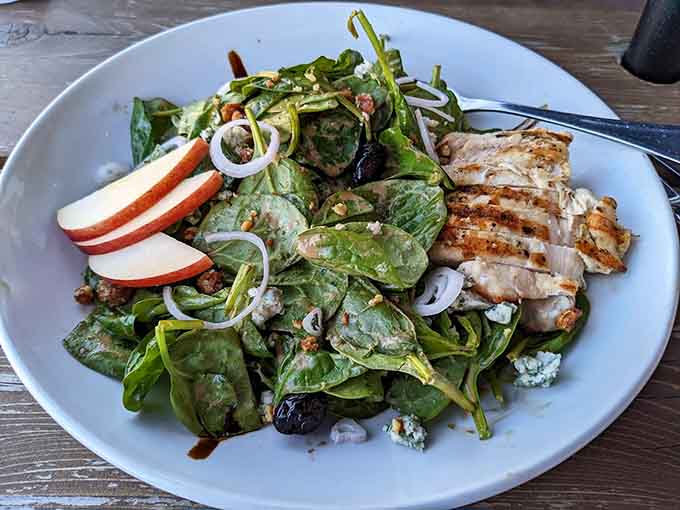 A salad that actually makes you excited about eating greens, featuring fresh ingredients that were probably growing nearby just days ago.