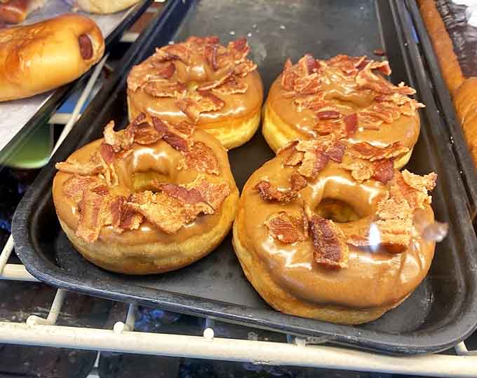 Maple bacon donuts &ndash; where breakfast foods collide in sweet-savory harmony. Those crispy bacon bits are like little flavor confetti celebrating on top.