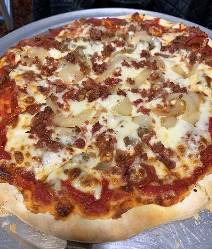 Pizza that doesn't need fancy toppings or artisanal credentials &ndash; just honest-to-goodness flavor that satisfies the soul.