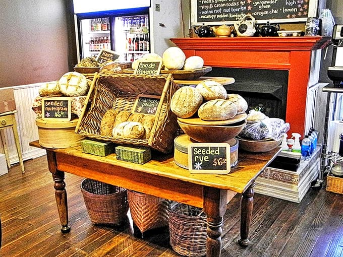 Artisanal loaves rest in rustic baskets, their crusty exteriors promising the kind of satisfying chew that makes you remember why bread is life.