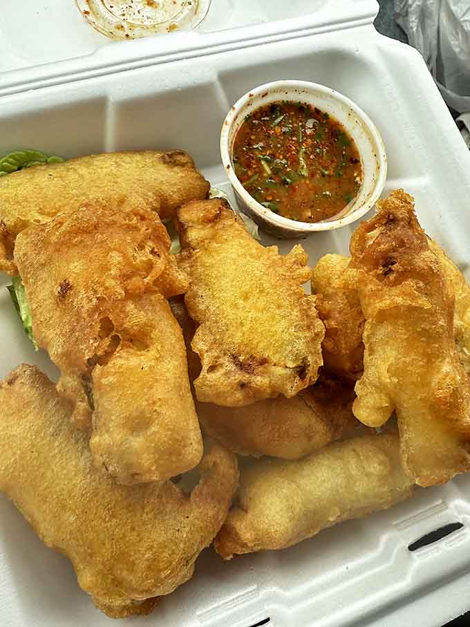 Crispy fried squid that would make even calamari-skeptics reconsider their life choices, paired with a dipping sauce worth bottling.
