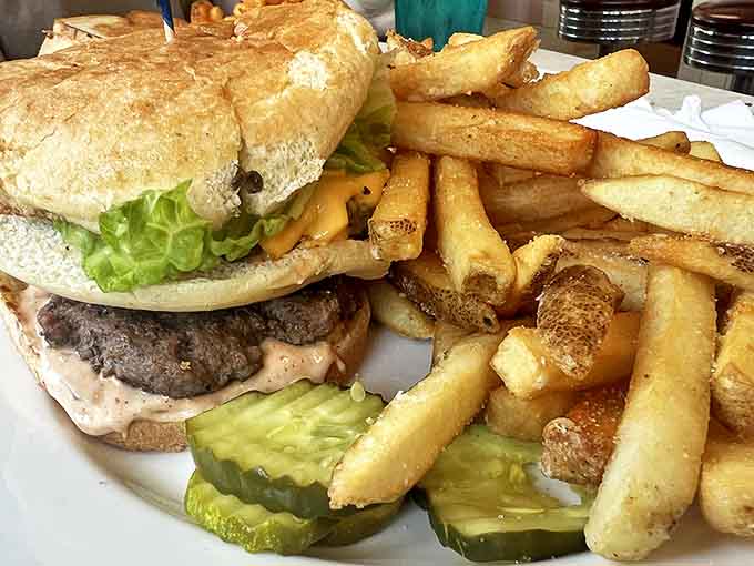 The classic burger and fries &ndash; not reinvented, not deconstructed, just perfected through decades of grill mastery and served with no pretension.