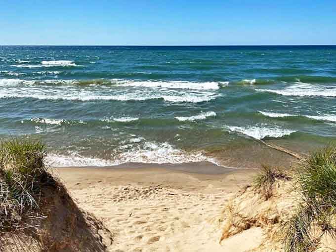 Lake Michigan shows off its many moods, from glass-calm mornings to playful whitecaps that beckon swimmers and surfers alike.