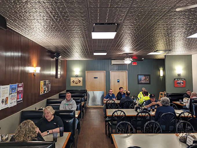 The dining room at Pagliai's buzzes with conversation and contentment&mdash;a community gathering place where pizza brings people together.