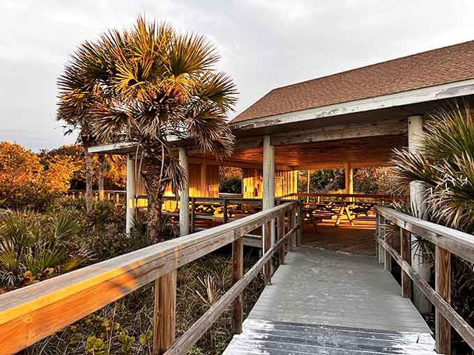 Golden hour transforms this rustic pavilion into waterfront dining worth a million bucks, minus the check.