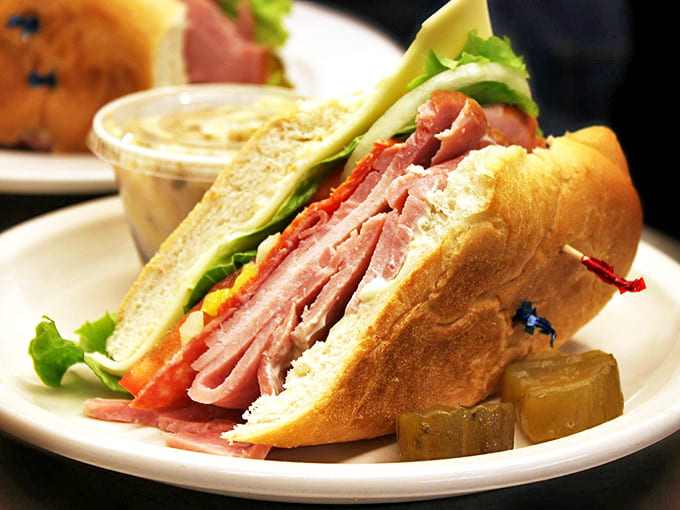 Sandwich architecture at its finest &ndash; layers of premium deli meats and fresh veggies creating the skyscraper of subs.