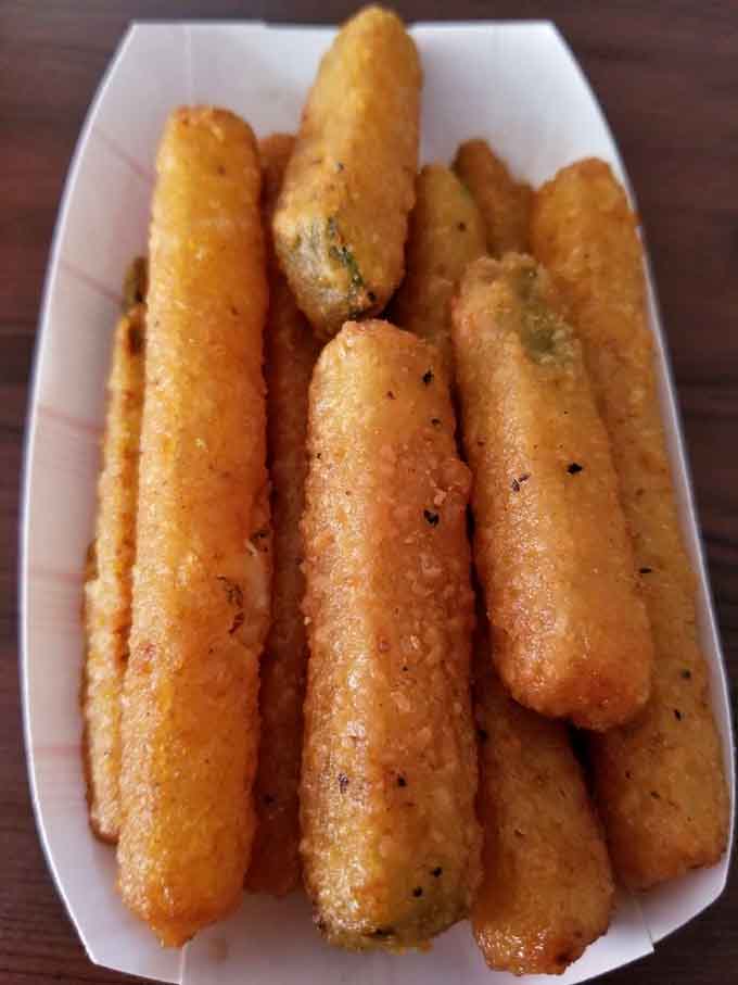 Golden zucchini sticks prove that vegetables can be just as exciting as anything else when they're fried to crispy perfection.
