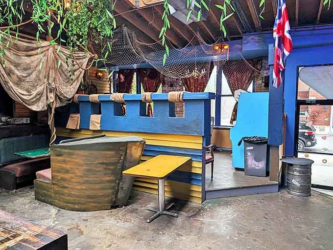 The nautical-themed seating area features fishing nets, weathered wood, and Union Jack flags &ndash; creating a quirky hideaway for pirates taking a break from digital treasure hunting.