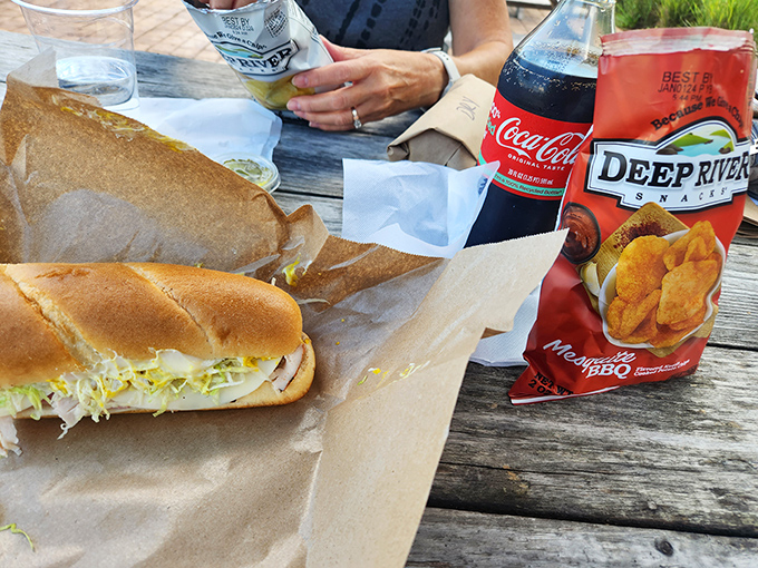 Sandwich and chips &ndash; the perfect lunch duo elevated by Red Barn's attention to detail and Vermont's scenic outdoor dining.