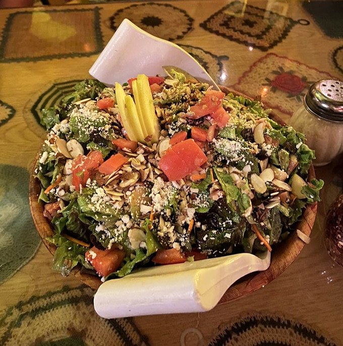 Even the salad refuses to be boring &ndash; a vibrant mountain of greens, veggies, and nuts that makes virtuous eating actually enjoyable.