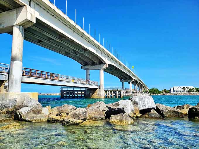 The Sebastian Inlet bridge spans the waterway like a concrete rainbow, connecting island paradise to mainland convenience.
