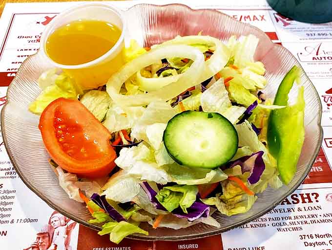 Even the side salad gets respect here – fresh, colorful vegetables that didn't come from a pre-mixed bag.