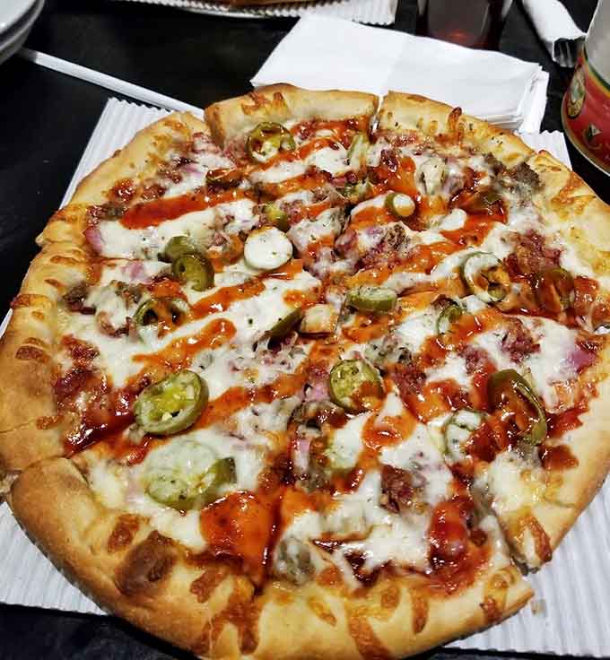 When you can't decide on toppings, go supreme and let the kitchen show off with peppers, onions, and everything wonderful.