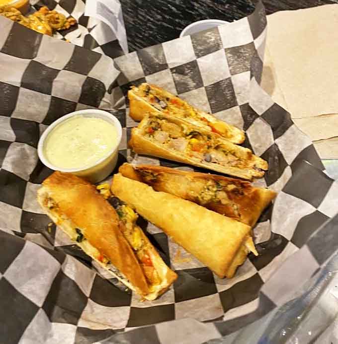 Southwest egg rolls break tradition deliciously, their crispy shells containing savory treasures that disappear faster than your quarters in Pac-Man.