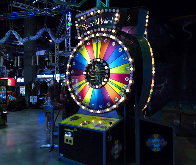 A kaleidoscope of arcade games creates a symphony of lights, sounds, and the occasional victory dance from successful players.