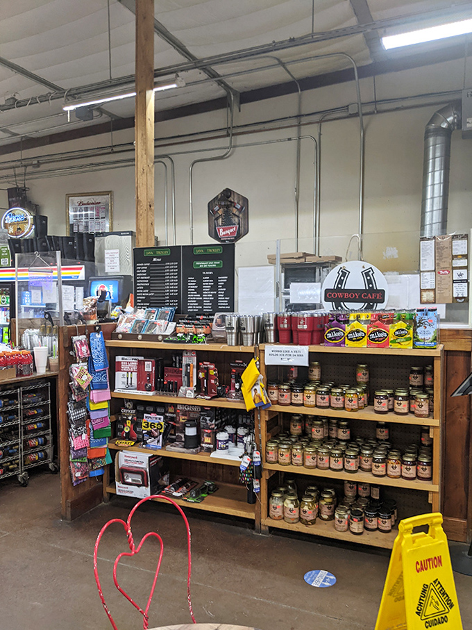 The Cowboy Cafe corner promises hearty sustenance and a moment's respite, with menu boards offering fuel for the next leg of your adventure.