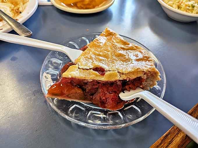 Each slice of strawberry rhubarb pie achieves that perfect balance between sweet and tart, with a flaky crust that's clearly made by experienced hands.