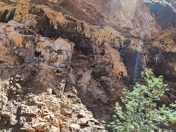 Nature's sculpture garden: centuries of water erosion have carved these magnificent formations, revealing layers of geological history in vibrant color.