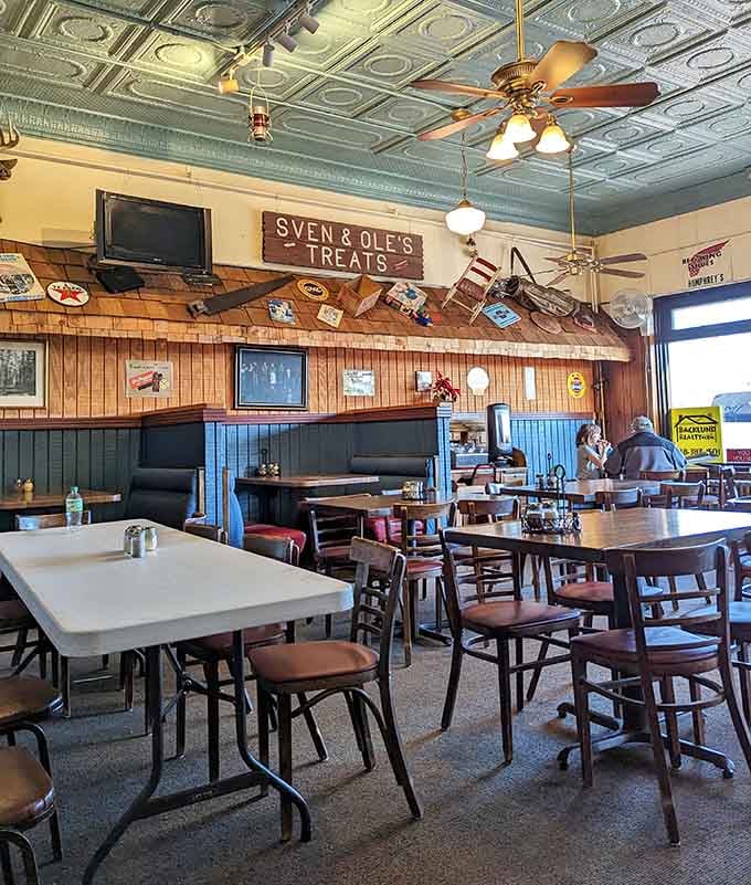 The dining room buzzes with happy customers enjoying their meals in a space that feels both nostalgic and comfortable at once.