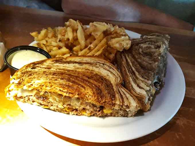The patty melt demonstrates that sometimes the best innovations come from reimagining the classics with quality ingredients.