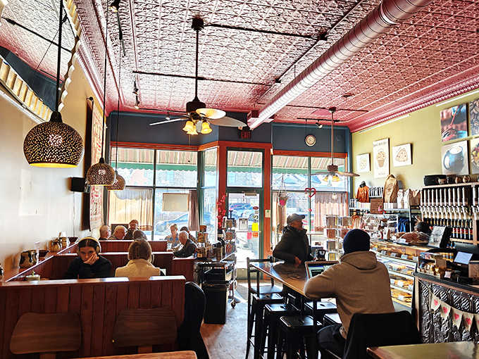 The caf&eacute;'s warm interior invites lingering conversations and spontaneous friendships&mdash;notice how nobody's staring at their phone?