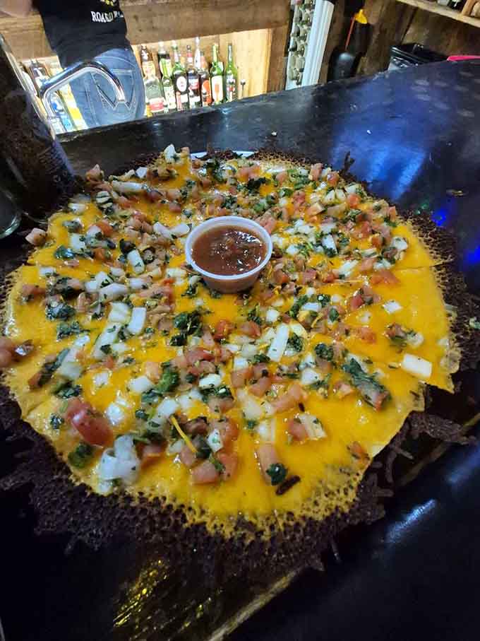 The cheese crisp arrives bubbling hot, a Southwestern specialty that's simple yet absolutely addictive.