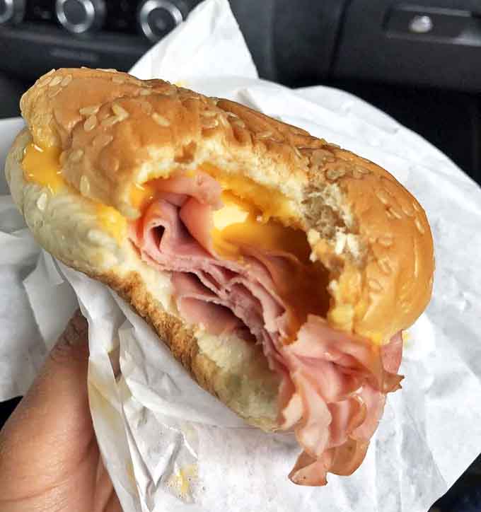 The hot fluffed ham sandwich &ndash; deceptively simple yet impossibly delicious, piled high with thinly sliced ham on a soft, fresh bun.