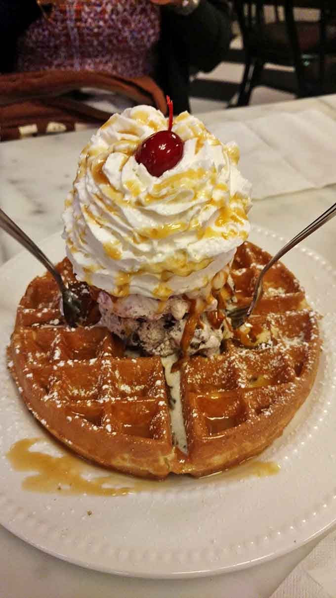 The Belgium Waffle Sundae creates a temperature contrast that's nothing short of magical &ndash; warm, crispy waffle meets cool, creamy surrender.