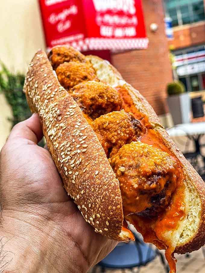 Meatballs nestled in bread with sauce and cheese, proving comfort food doesn't need to be complicated.