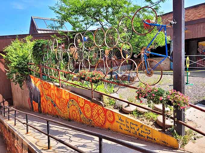 Art meets function in this whimsical fence made from repurposed bicycle wheels, proving Houghton's creativity extends beyond conventional boundaries.
