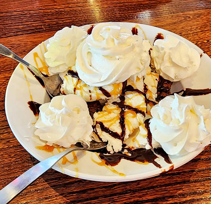 The brownie sundae that somehow finds room in stomachs already housing half a cow. Warm, fudgy decadence topped with clouds of whipped cream.