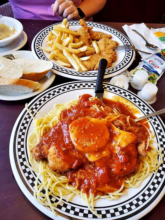 Chicken Parmesan that would make any Italian grandmother nod in approval &ndash; crispy, saucy, cheesy perfection atop a bed of perfectly cooked spaghetti.