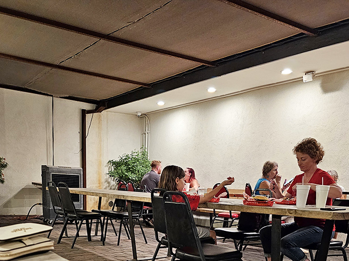 The dining room hums with satisfaction as patrons dive into their meals, creating the soundtrack of a true barbecue joint.