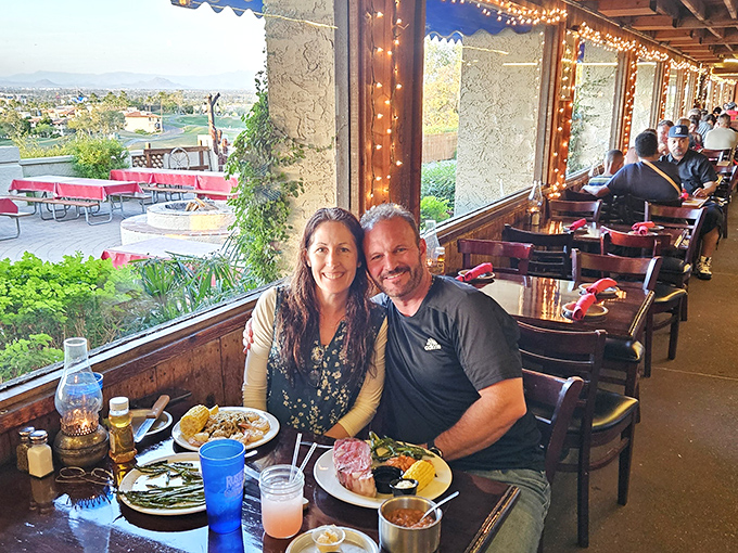 Warm indoor seating and window views create a welcoming setting for a relaxed, memorable meal together.