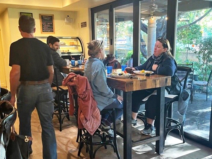 The caf&eacute;'s interior buzzes with the energy of happy diners discovering why locals speak of this place with such breakfast reverence.