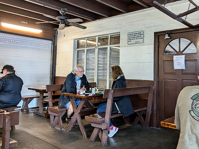 Locals and tourists alike find common ground at these wooden picnic tables, united by the universal language of exceptional smoked fish.