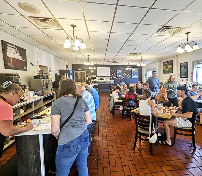 The bustling dining room speaks volumes – when locals pack a place this consistently, you know you've found something special.