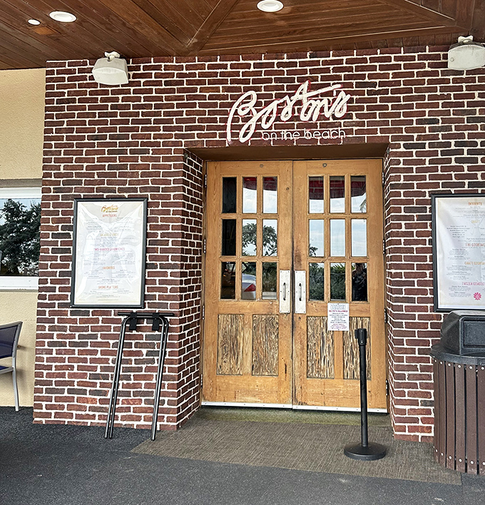 Brick façade and wooden doors create an authentic Boston tavern entrance that transports you north the moment you cross the threshold.