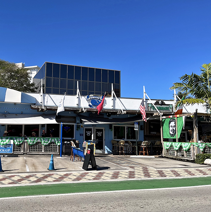 Flags flutter above the entrance like a maritime welcome committee, beckoning seafood lovers to their happy place.