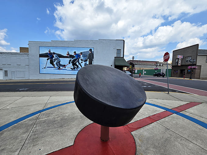 The massive hockey puck looks ready to slide across the plaza at any moment &ndash; thankfully, it's firmly anchored, or downtown Eveleth might need some serious rebuilding.