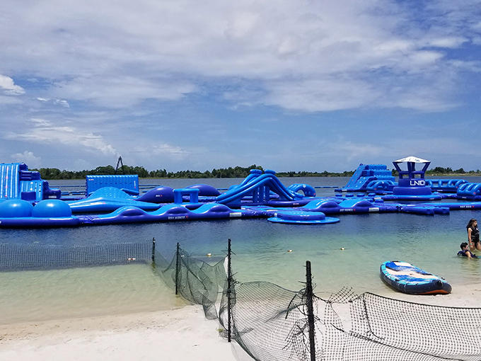 A floating obstacle course that makes "American Ninja Warrior" look like a casual stroll. The blue playground beckons to the brave and foolhardy alike.