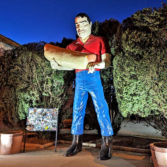 After dark, dramatic lighting transforms our friendly giant into a mysterious figure from roadside mythology.