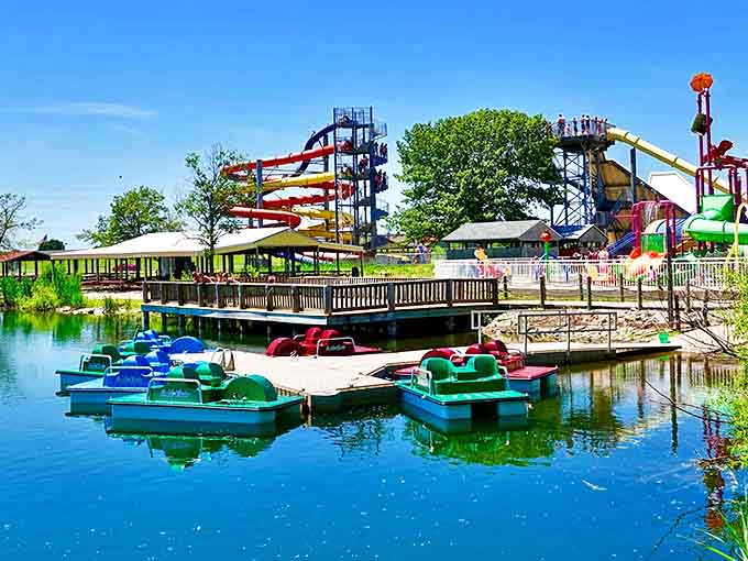 Paddle boats await their captains on the tranquil lake, offering a peaceful respite from waterslides and a guaranteed leg workout in disguise.