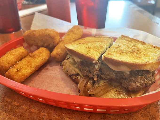 The patty melt bridges that beautiful gap between burger and sandwich, with cheese doing the important work of holding everything together deliciously.