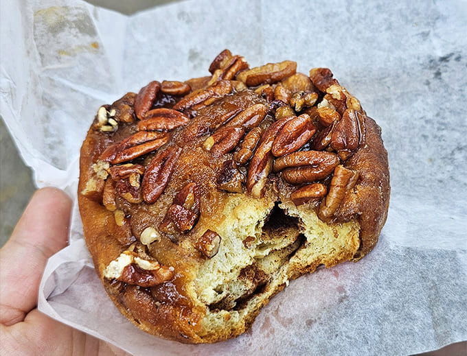 Behold the architectural marvel that is Van's pecan sticky bun &ndash; layers of dough, cinnamon, and caramelized nuts creating a sweet skyscraper worth every sticky finger.