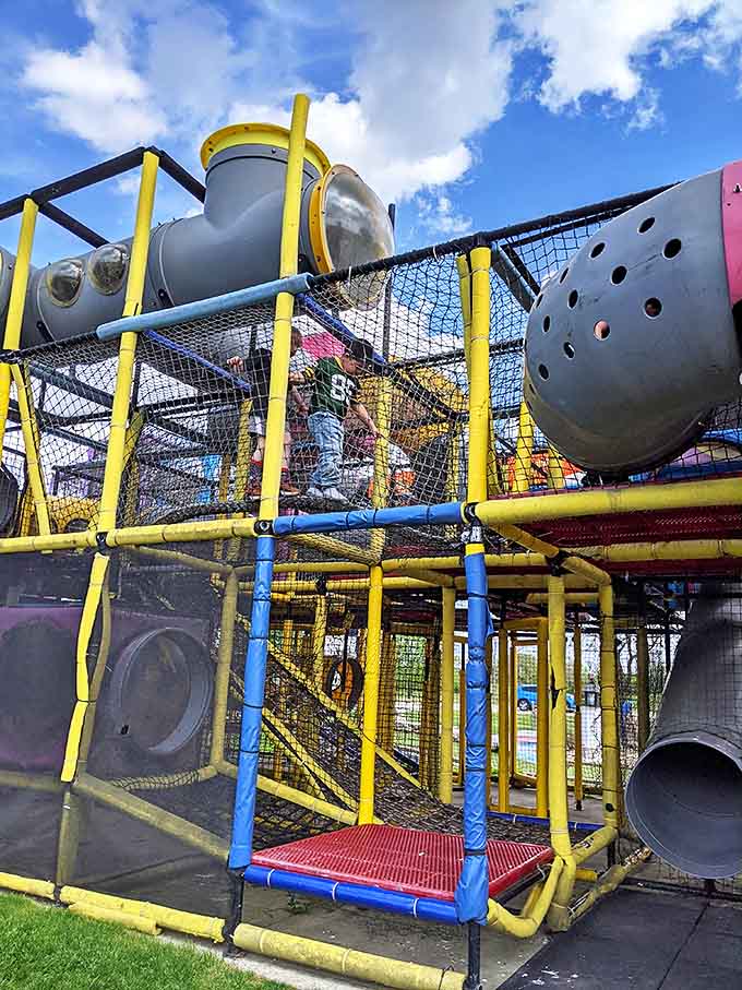 This playground structure has witnessed more energy being burned in an hour than most living rooms see in a month. Parental nap scheduling begins here.