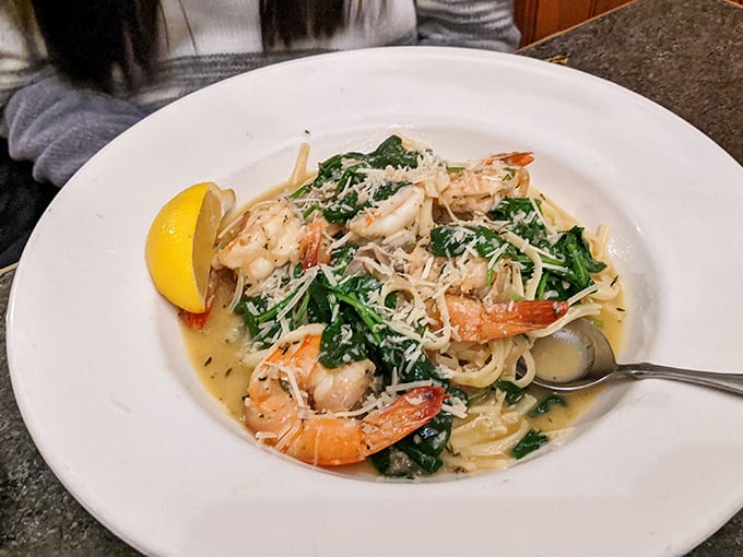 Shrimp linguine that would make an Italian grandmother nod in approval &ndash; perfectly cooked pasta embracing plump shrimp and vibrant greens.