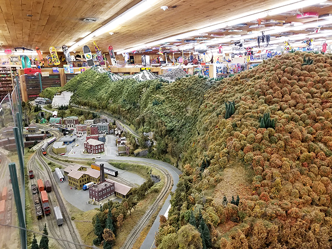 Meticulous craftsmanship brings this miniature landscape to life, complete with tiny buildings and impossibly perfect autumn foliage.